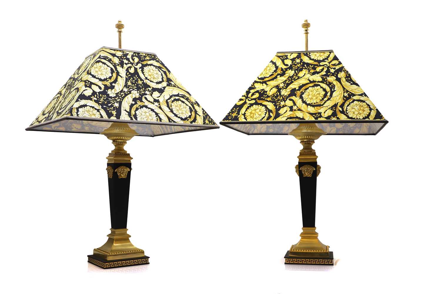 Lot 418 - A pair of Versace Medusa table lamps,