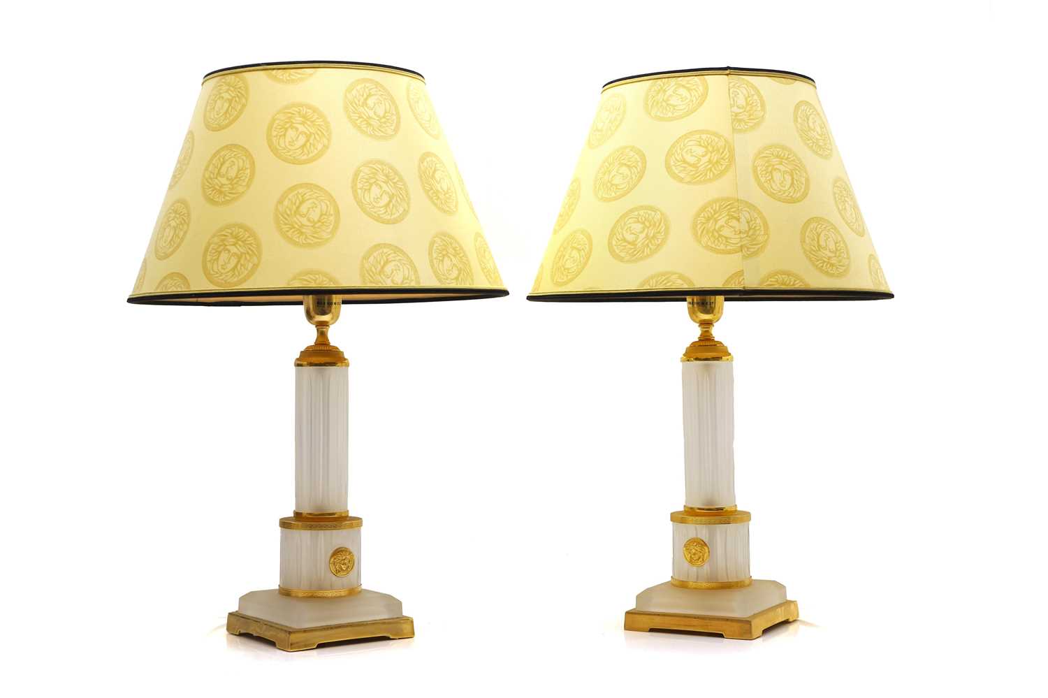 Lot 419 - A pair of Versace Medusa table lamps,