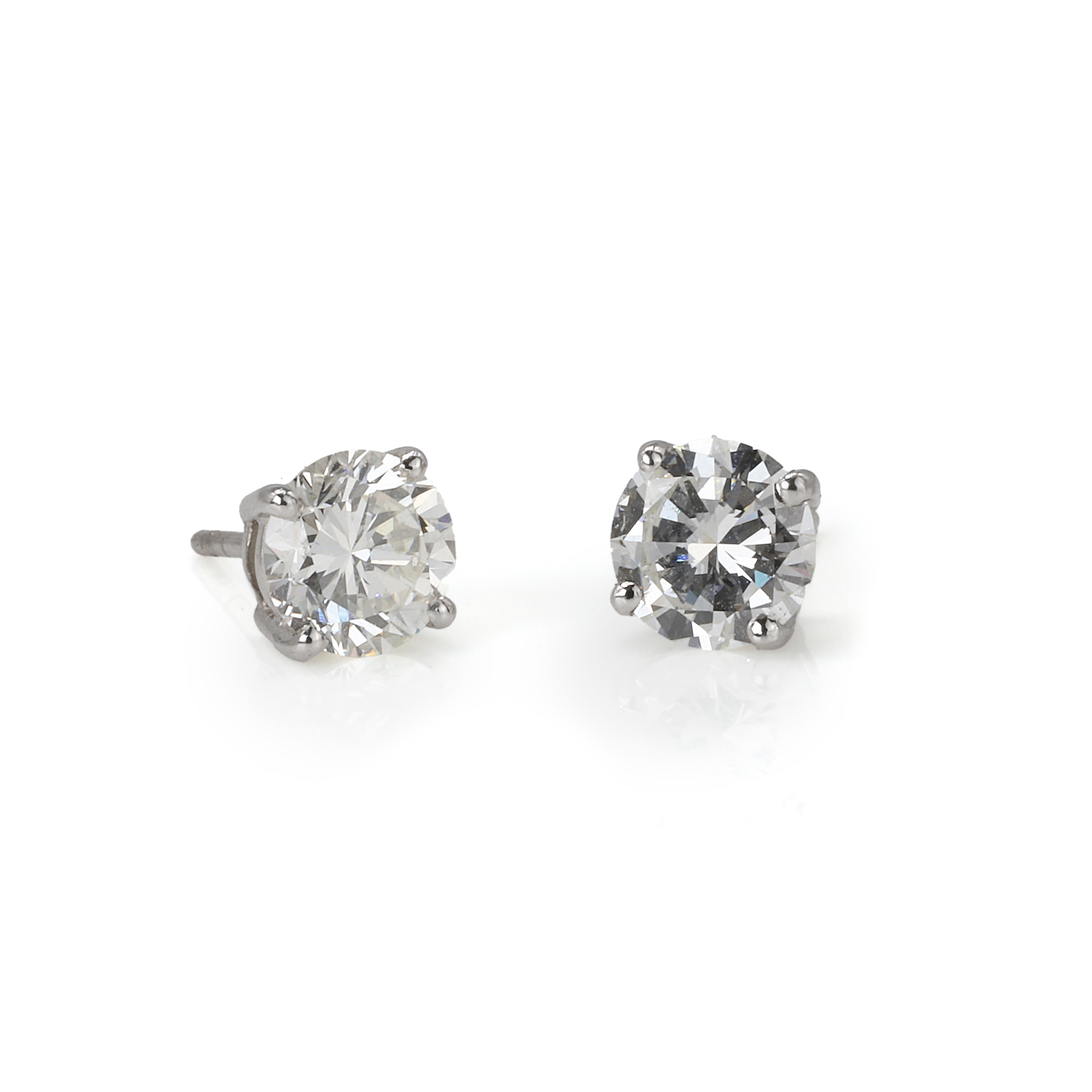 Lot 228 - A pair of diamond single stone stud earrings,