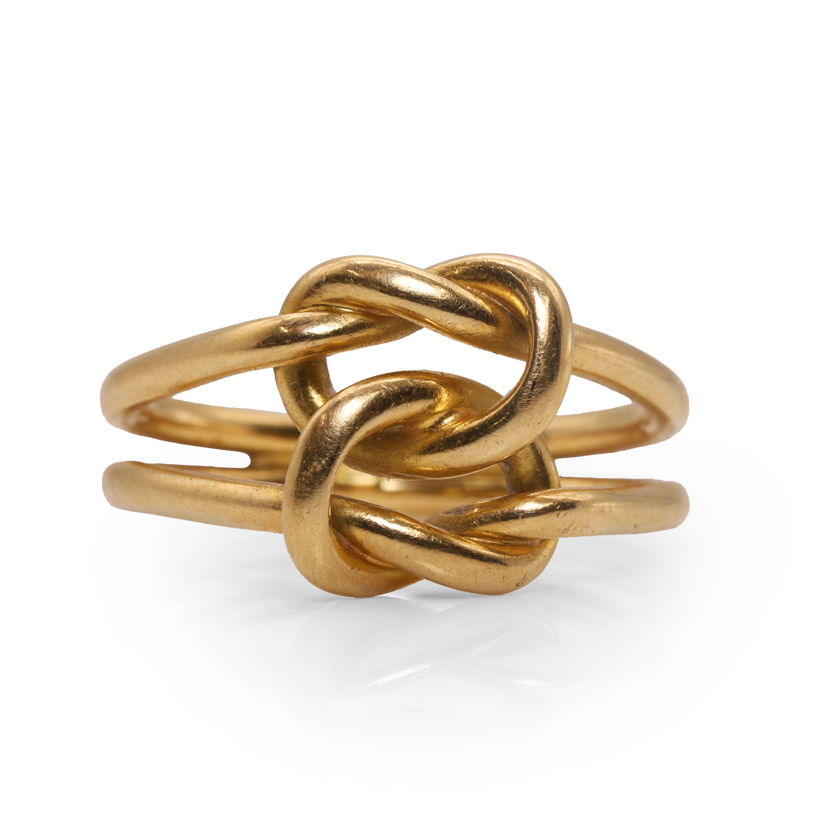 Lot 118 - An 18ct gold knot ring,