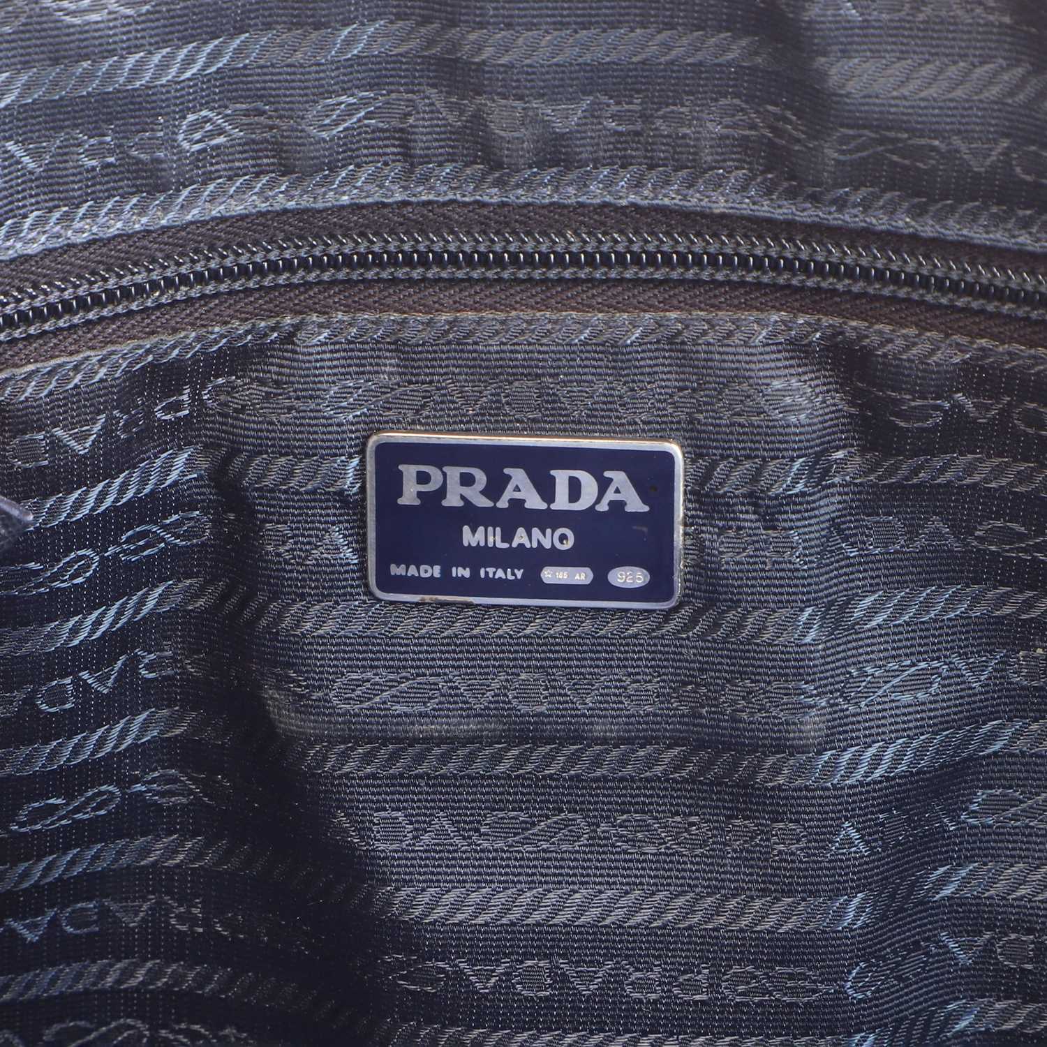 Lot 1447 - A Prada navy blue leather handbag